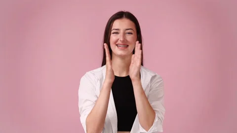 Girl Clapping Cheeks Stock Videos – Royalty-Free HD & 4K Videos