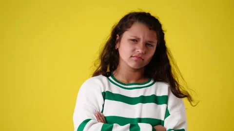 4k video of girl's head shake on yellow ... | Stock Video | Pond5