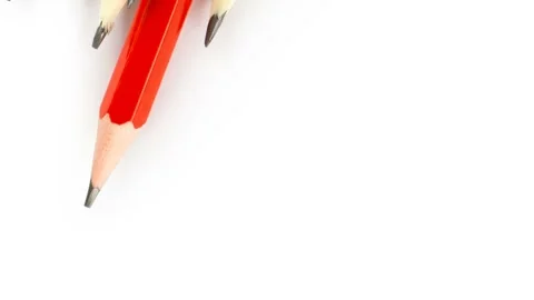 4K view of pencils with a single red pen... | Stock Video | Pond5