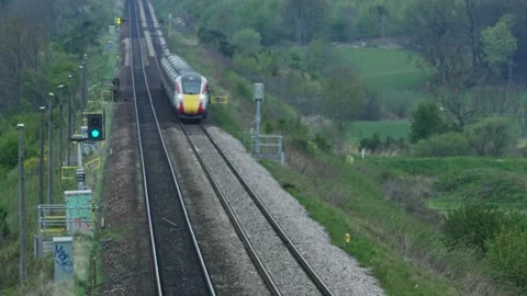 4k - Virgin Rail Train in Slow Motion | Stock Video | Pond5
