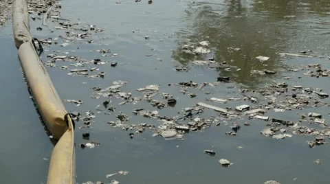 4K Water Pollution Floating In Dirt | Stock Video | Pond5