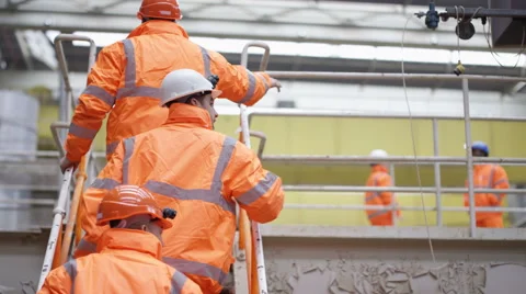 4K Workers in power station walking thro... | Stock Video | Pond5