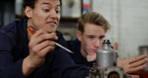 4K Young apprentice mechanic with bad at... | Stock Video | Pond5