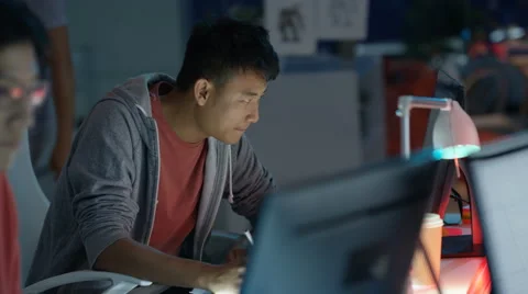 4K Young computer game designer drawing ... | Stock Video | Pond5