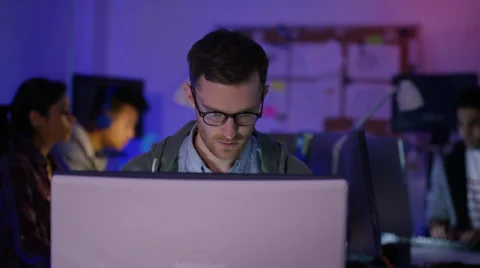 4K Young computer hacker trying to gain ... | Stock Video | Pond5