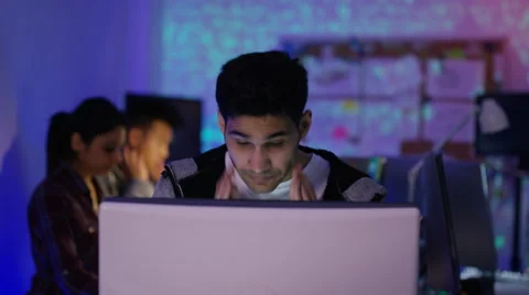 4K Young computer hacker trying to gain ... | Stock Video | Pond5