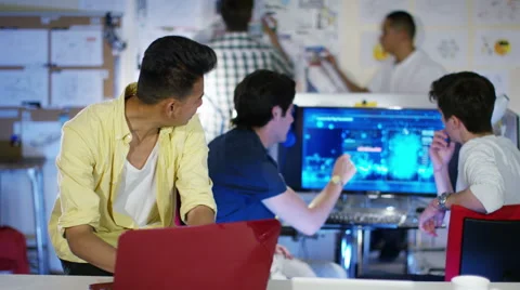 4K Young creative computer design team w... | Stock Video | Pond5