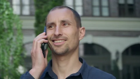 4k Young Man Standing in Street In Backg... | Stock Video | Pond5
