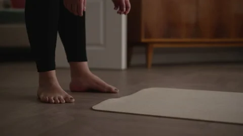 4k Young overweight woman is putting mat... | Stock Video | Pond5