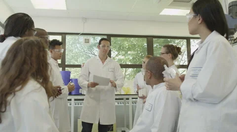 4K Young student scientists in group mee... | Stock Video | Pond5