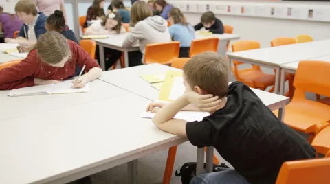 4K Young students working at their desks... | Stock Video | Pond5