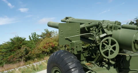 6 inch gun World War II sitting on beach... | Stock Video | Pond5