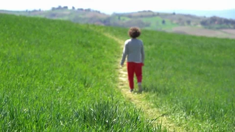 7 years old boy child walking alone in ... | Stock Video | Pond5