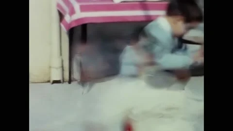70's children play in the yard | Stock Video | Pond5