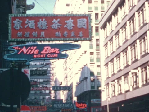 70s vintage movie: Street with signs and... | Stock Video | Pond5