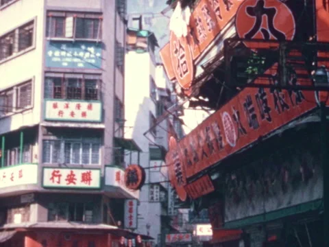 70s vintage movie: Street with signs and... | Stock Video | Pond5