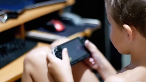 Kid Playing Video Game Stock Footage ~ Royalty Free Stock Videos | Pond5