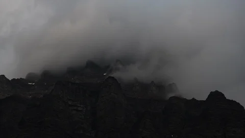 8K Close up of clouds flowing around mou... | Stock Video | Pond5