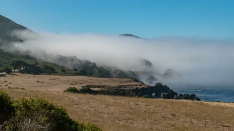 8K Timelapse of coastal fog rolling arch... | Stock Video | Pond5
