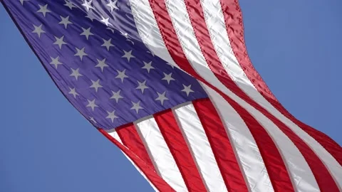 8k vertical video American Flag on blue ... | Stock Video | Pond5