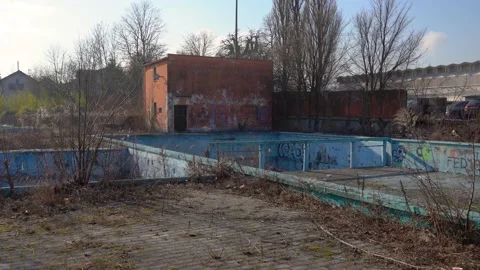 Abandoned empty outdoor swimming pool | Stock Video | Pond5