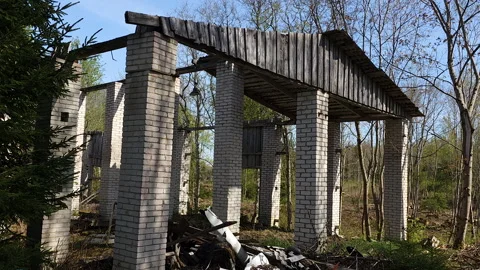 An abandoned house with lots of trash on... | Stock Video | Pond5