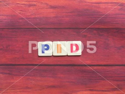 Abbreviation PID (Pelvic Inflammatory Disease) on wood background Stock ...