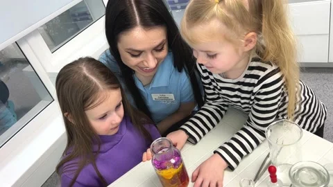 aboratory of chemical experiments two gi... | Stock Video | Pond5