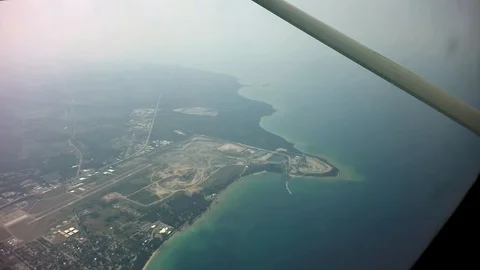 Above Lake Michigan in Charlevoix Flying... | Stock Video | Pond5