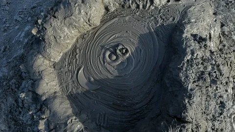 Above view of mud exploding at the Mud V... | Stock Video | Pond5