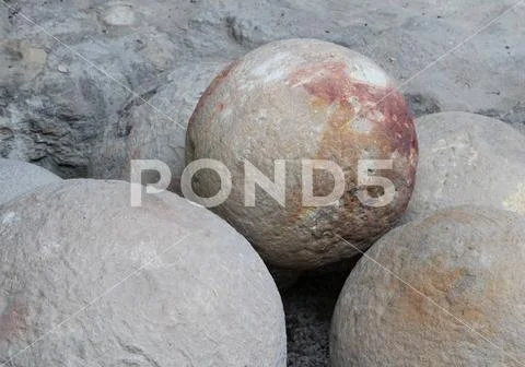 Photograph: Abstract background pattern Ancient canon balls made of ...