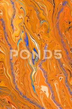 Abstract bright fluid orange background with blue grain veins. Art ...