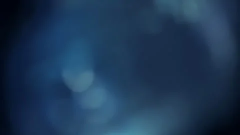 Abstract dark blue background with bokeh... | Stock Video | Pond5