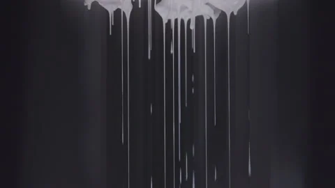 Abstract Dripping White Paint in Studio ... | Stock Video | Pond5