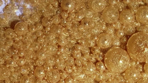Abstract of gold pearl bubbles rotating ... | Stock Video | Pond5