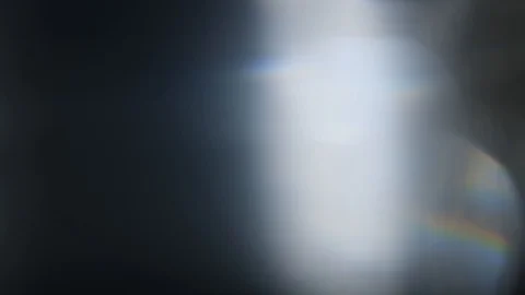 Abstract light leaks on black background... | Stock Video | Pond5