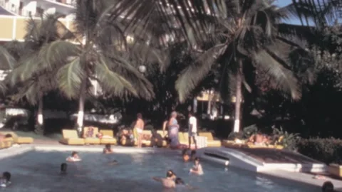 Acapulco - 1980: People relax by the poo... | Stock Video | Pond5