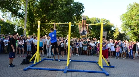 Acrobatic exercises, horizontal bar. | Stock Video | Pond5