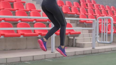 Active athletic girl doing leg warm up e... | Stock Video | Pond5