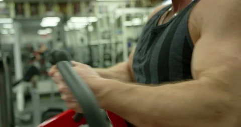 Active bodybuilder young man lifting hea... | Stock Video | Pond5