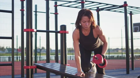 Active female person pumps up forearm mu... | Stock Video | Pond5