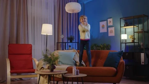 Active funny girl kid jumping, dancing, ... | Stock Video | Pond5