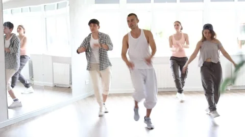 Active young guys and girls practicing h... | Stock Video | Pond5