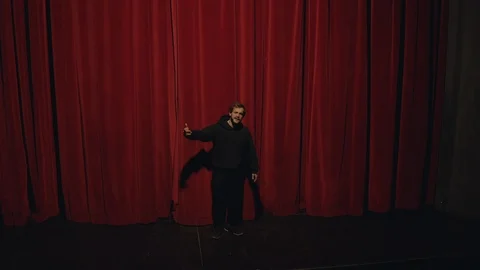 Actor in a theatre reviewing the script | Stock Video | Pond5