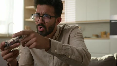 Addicted male gamer Arabian Indian man g... | Stock Video | Pond5