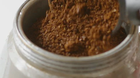 Adding Grounded Coffee Beans into Italia... | Stock Video | Pond5