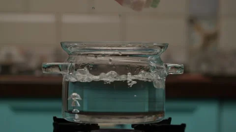 Adding vegetables into transparent pot w... | Stock Video | Pond5