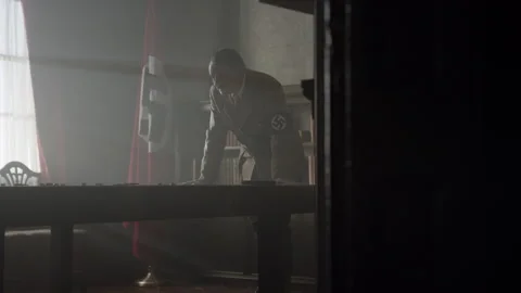 Adolf Hitler in office leaning against d... | Stock Video | Pond5