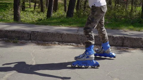 Adorable boy riding on roller skates in ... | Stock Video | Pond5