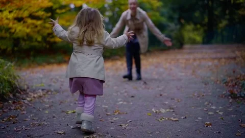 Adorable daughter running fast to her mo... | Stock Video | Pond5